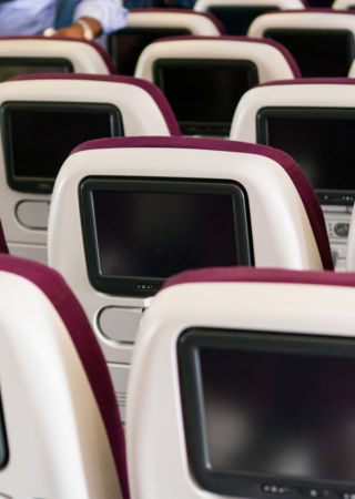 Would You Pay Extra for First-Class Perks in Coach? | Budget Travel